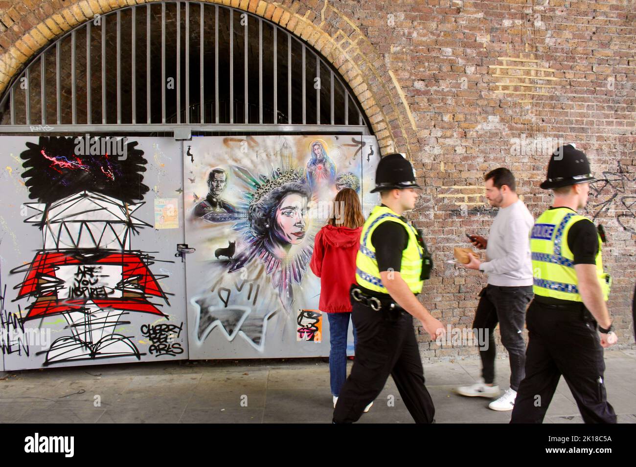 graffiti tributes to queen elizabeth 2; scenes from central london in ...