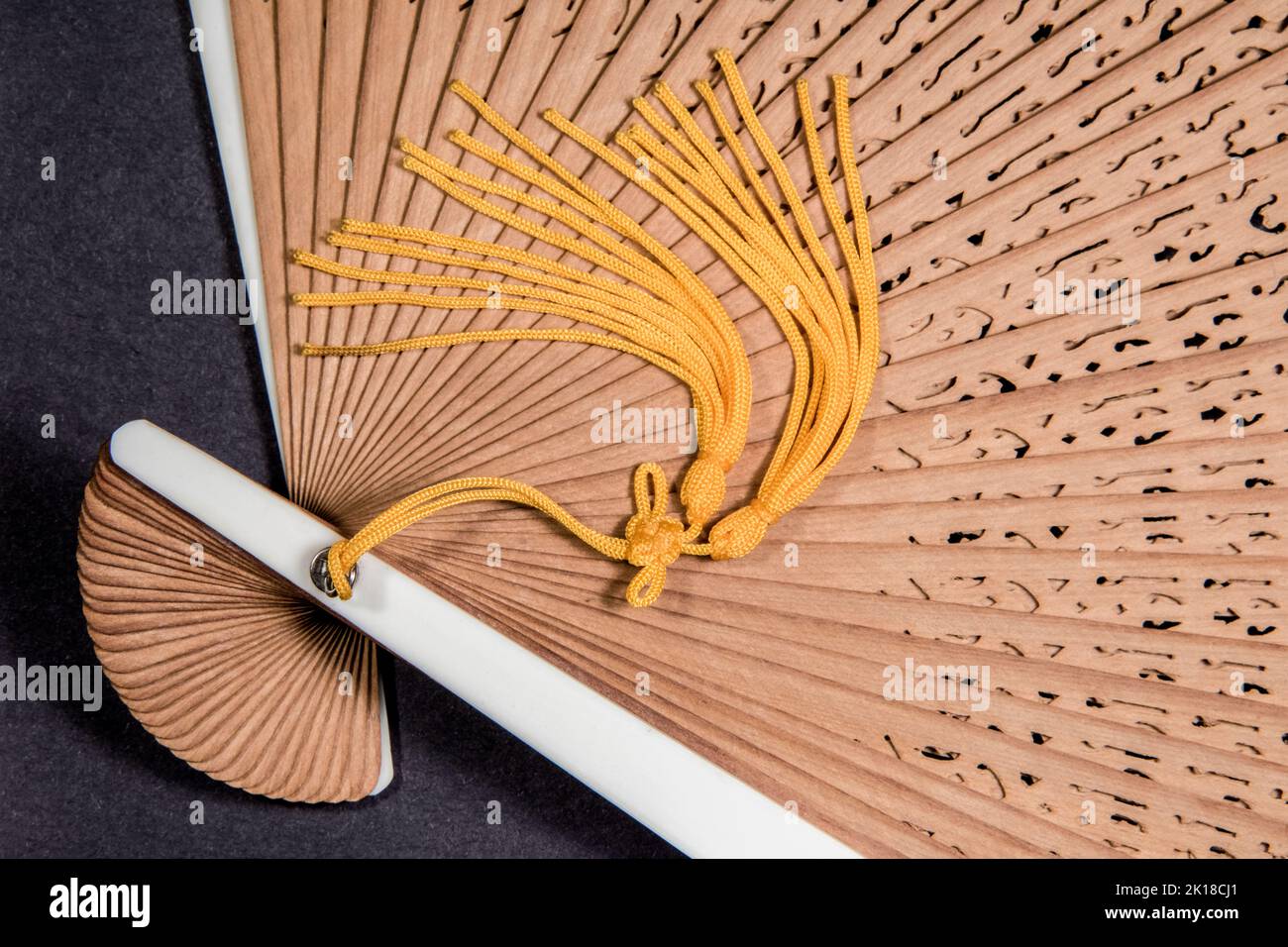 Antique wooden fan evenly spread out Stock Photo - Alamy