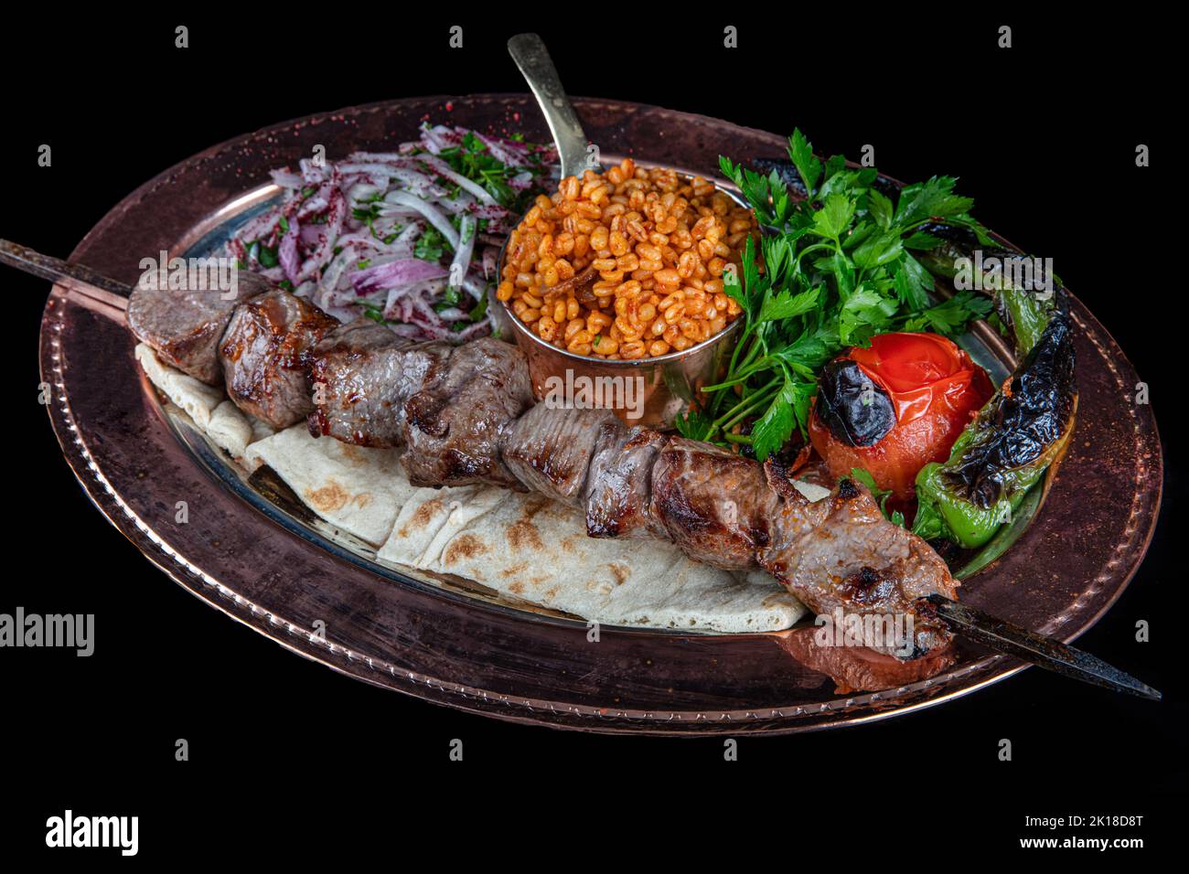 Traditional Turkish cuisine Lamb skewers on a barbecue skewer, grilled ...