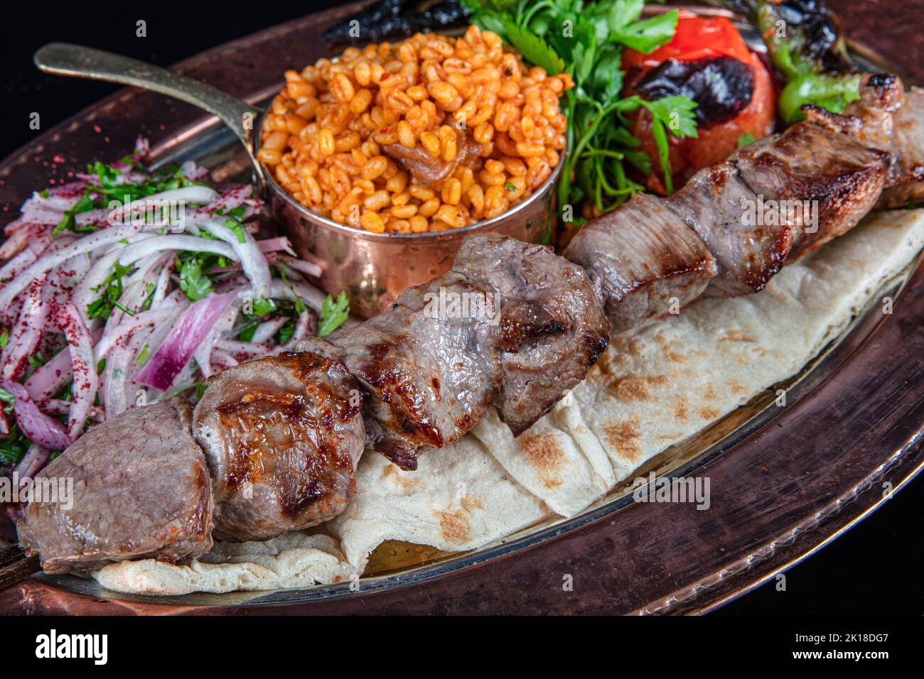 Traditional Turkish cuisine Lamb skewers on a barbecue skewer, grilled ...