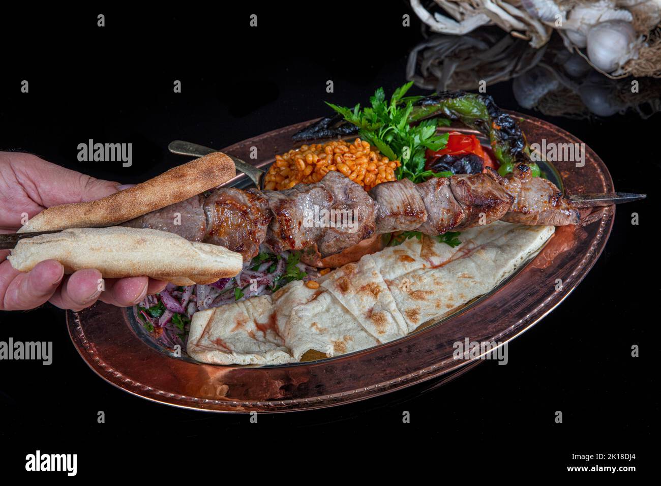 Traditional Turkish cuisine Lamb skewers on a barbecue skewer, grilled ...