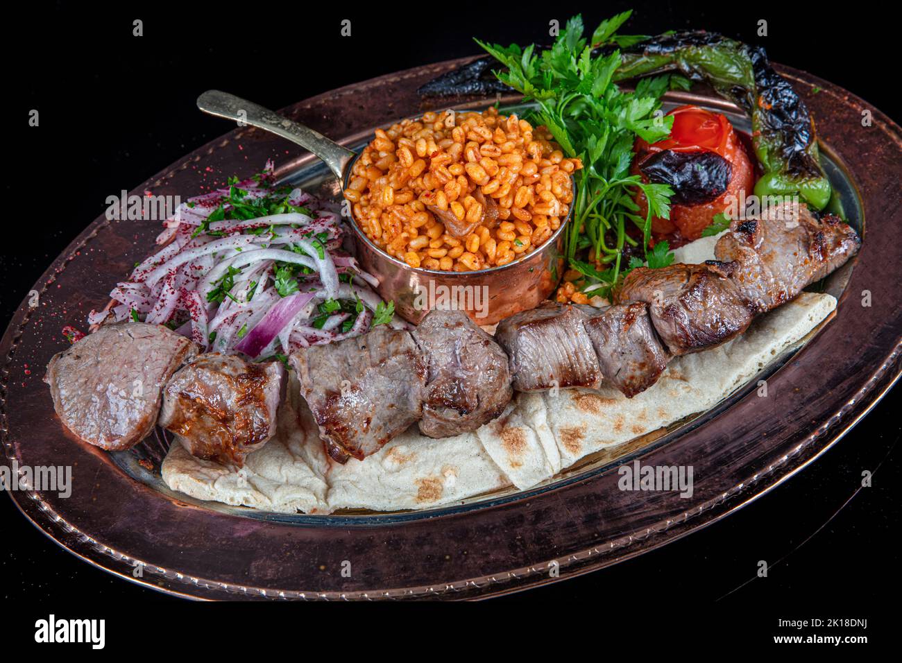 Traditional Turkish cuisine Lamb skewers on a barbecue skewer, grilled ...