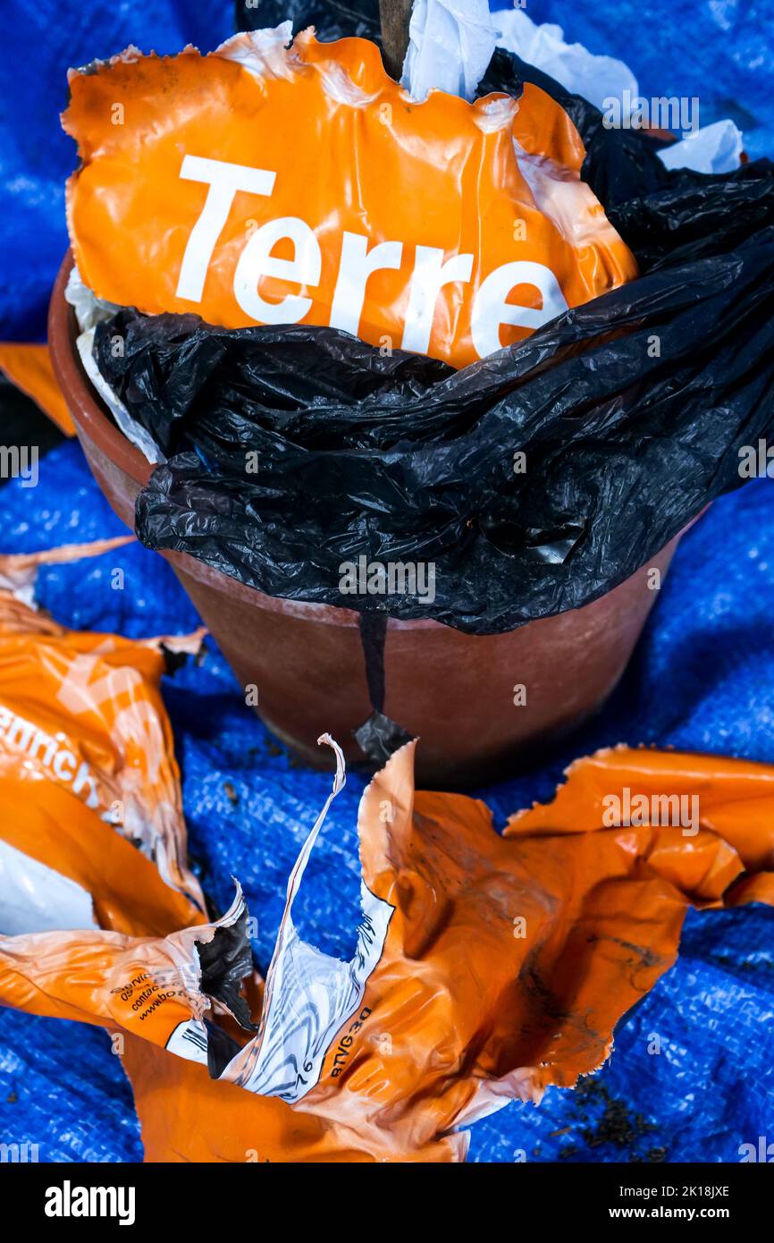 Plastic wrapped plant pot, conceptual studio photography, Lyon, France ...