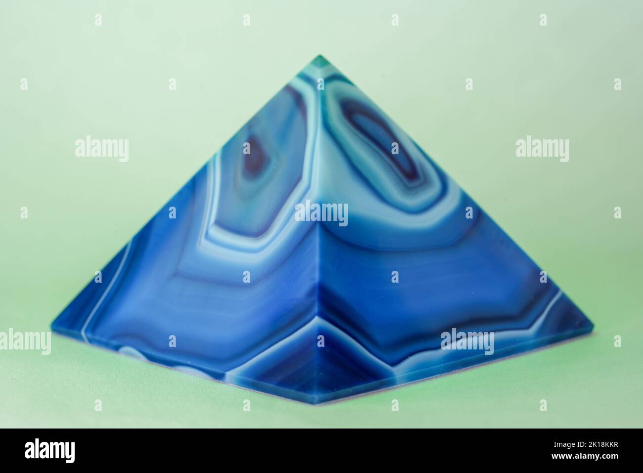 Blue violet pyramid of agate with quartz inclusions or worked as a disc ...