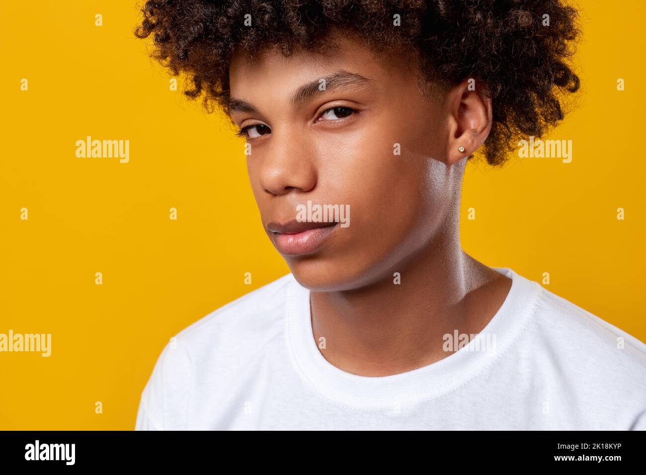 Black teenager portrait. Social tolerance. Skeptic african young guy ...