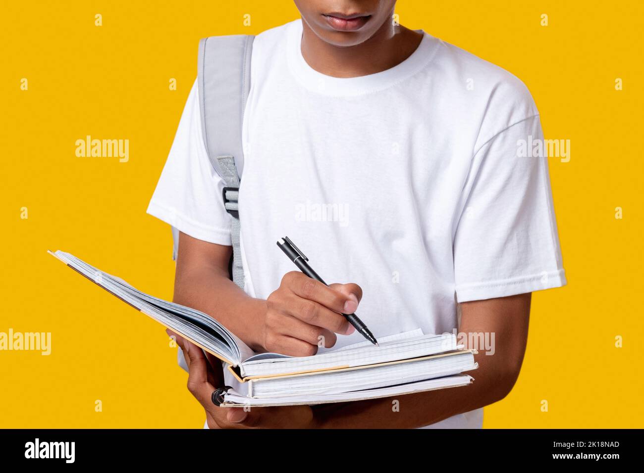 Smart black teenager. Student lifestyle. Unrecognizable african guy ...