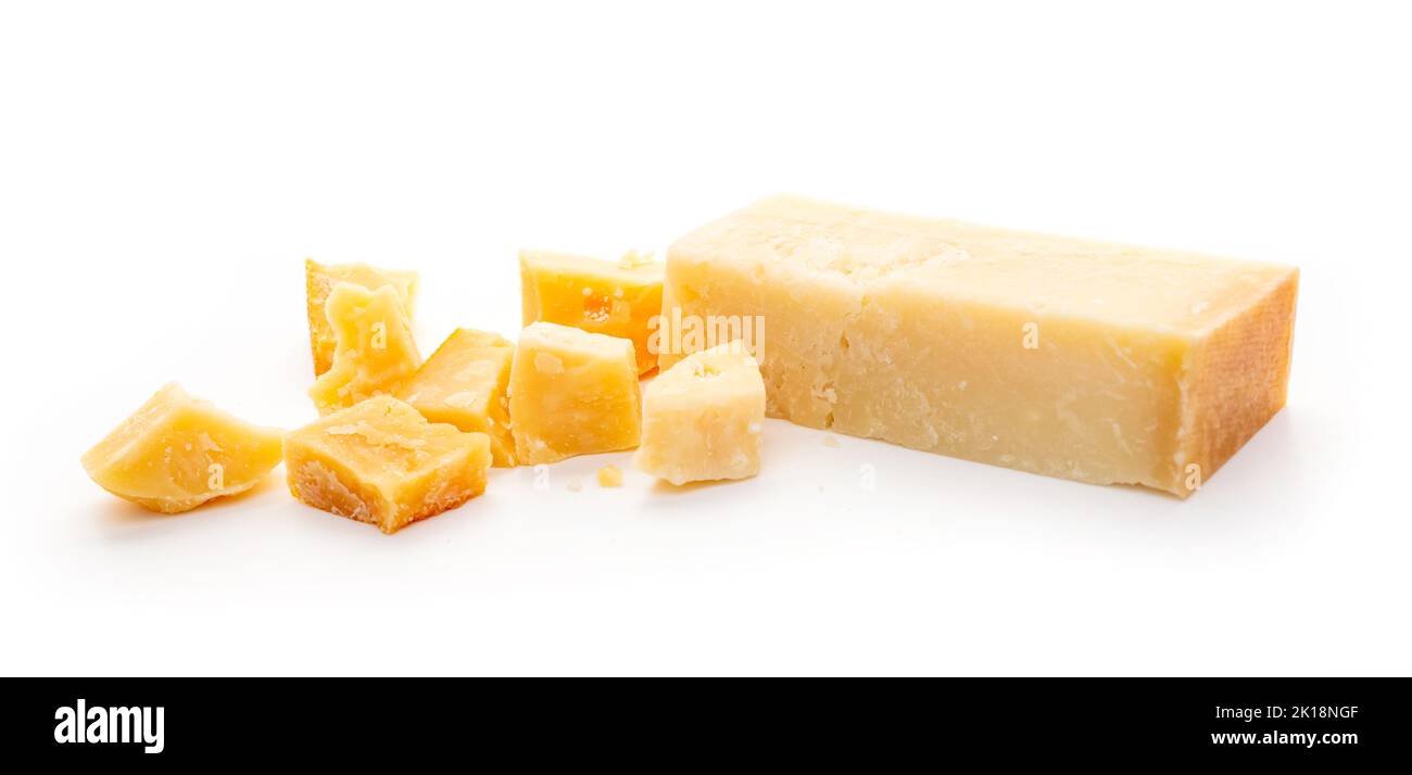 Piece of parmesan cheese on white Stock Photo - Alamy