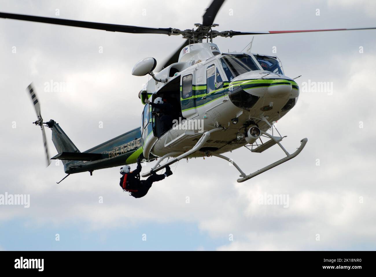 Fire rescue helicopter performs life saving mission Stock Photo - Alamy