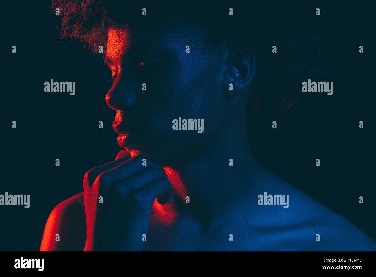 Black man silhouette. Neon light portrait. Thoughtful african male in ...