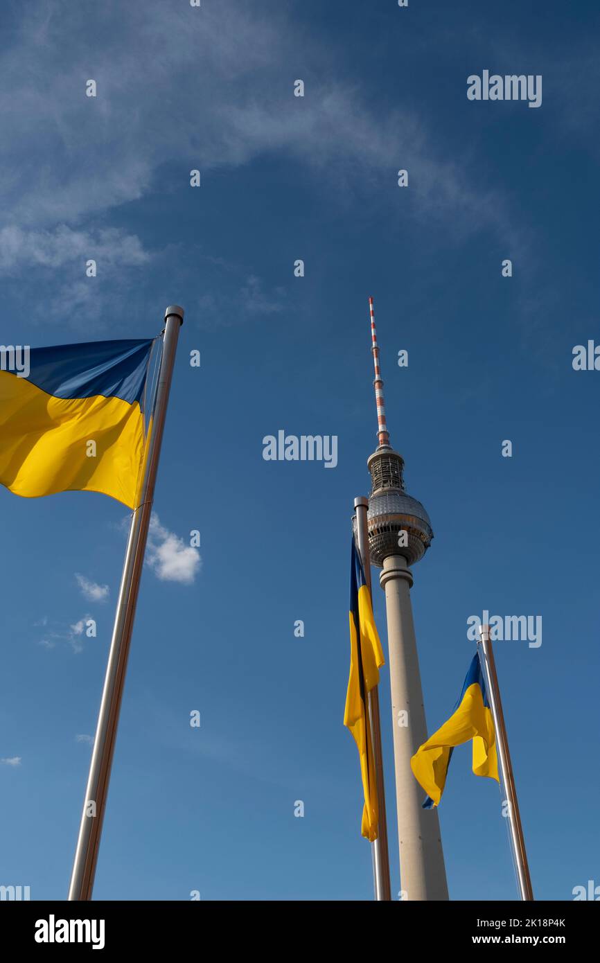Berliner Fernsehturm (Berlin TV tower) and Ukrainian flags. Mitte ...