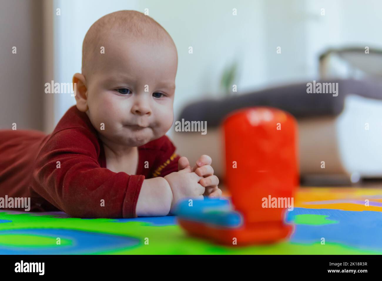 cute little baby playing with your baby phone Stock Photo - Alamy