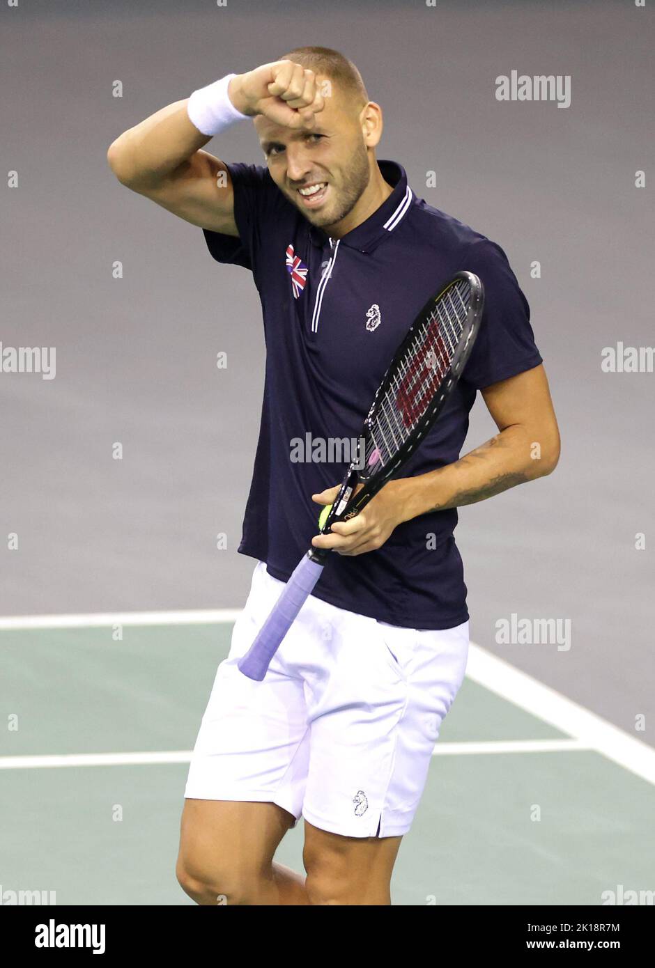 Great Britain's Dan Evans celebrates winning the first game during the ...