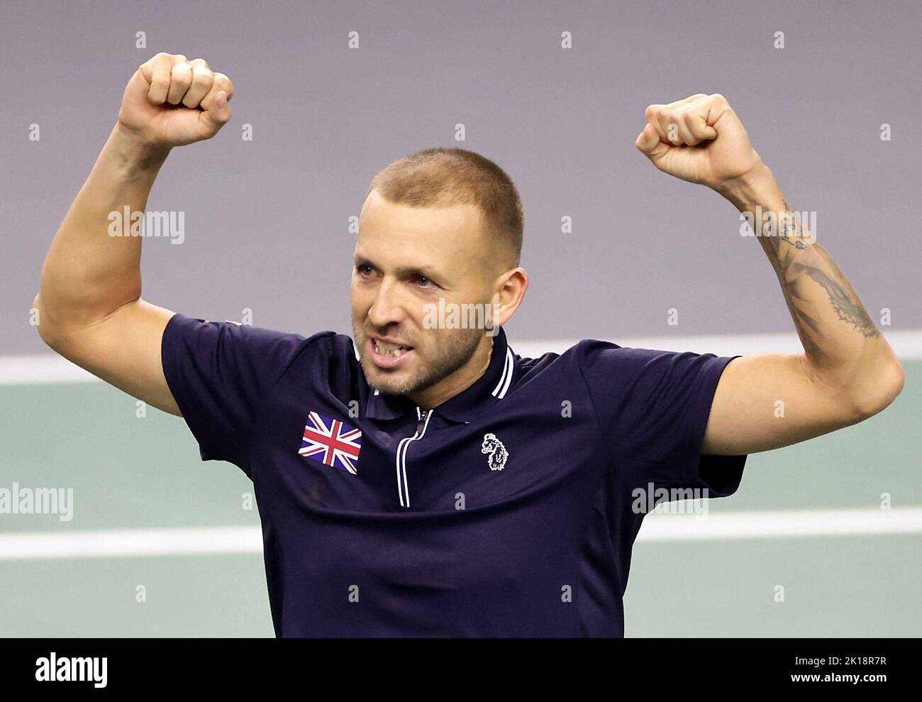 Great Britain's Dan Evans celebrates winning the first game during the ...