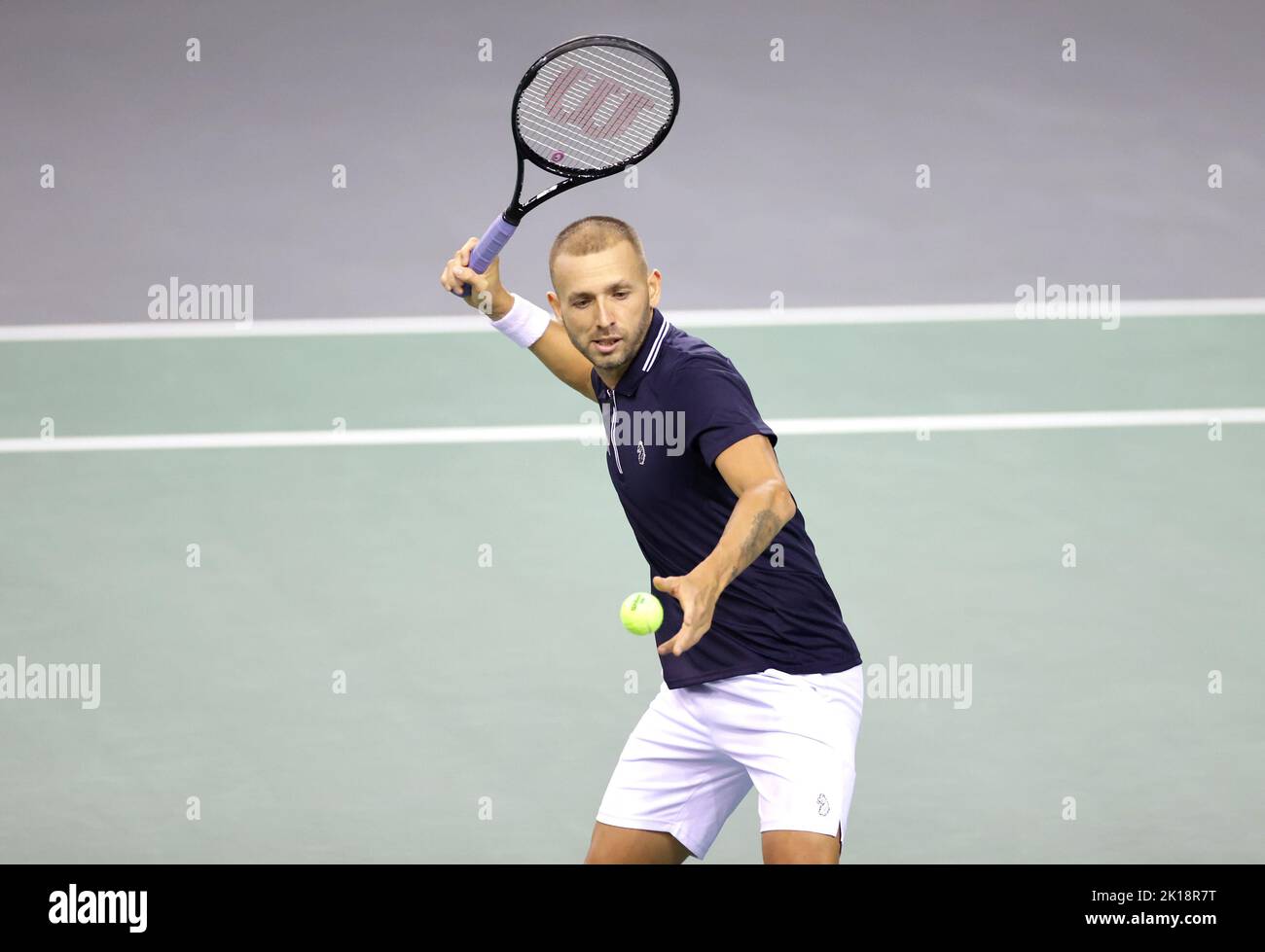 Great Britain's Dan Evans celebrates winning the first game during the ...