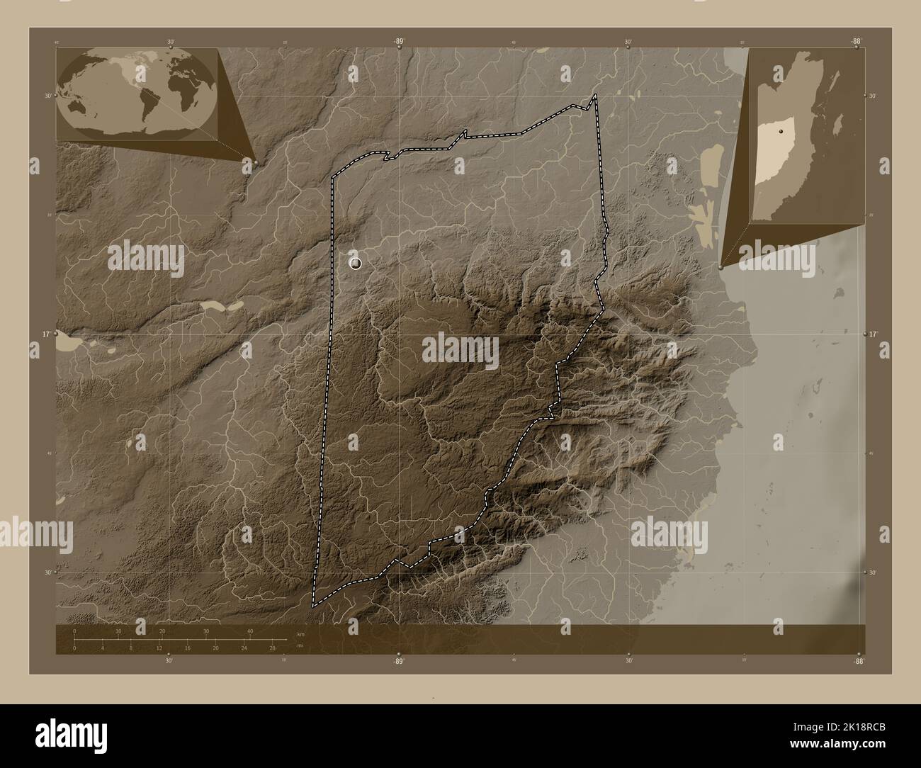 Cayo, district of Belize. Elevation map colored in sepia tones with ...