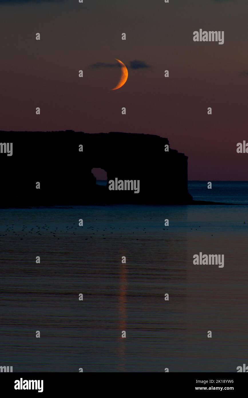 Crescent moon setting over Atlantic, Skaill Bay, Orkney Stock Photo - Alamy