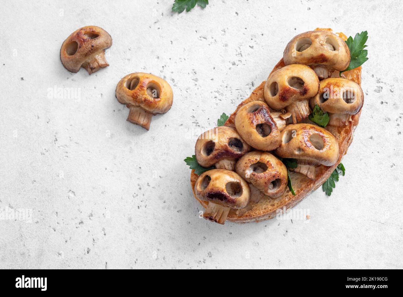 Halloween spooky sandwich bread with skull-shaped mushroom Stock Photo ...