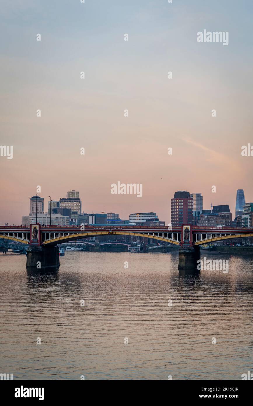 View of Vauxhall Bridge over the River Thames at sunset, London ...