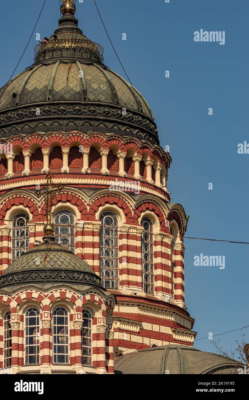 A tall temple with a blue sky background Stock Photo - Alamy