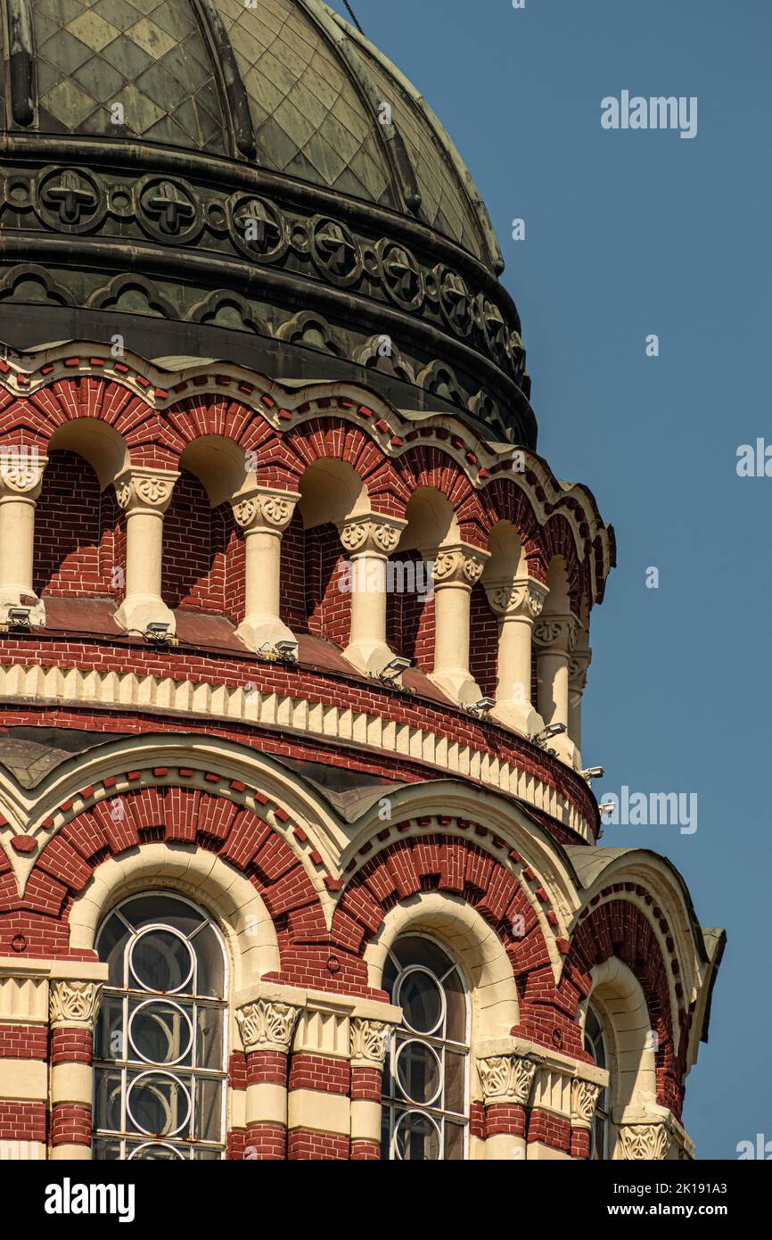 A tall temple with a blue sky background Stock Photo - Alamy