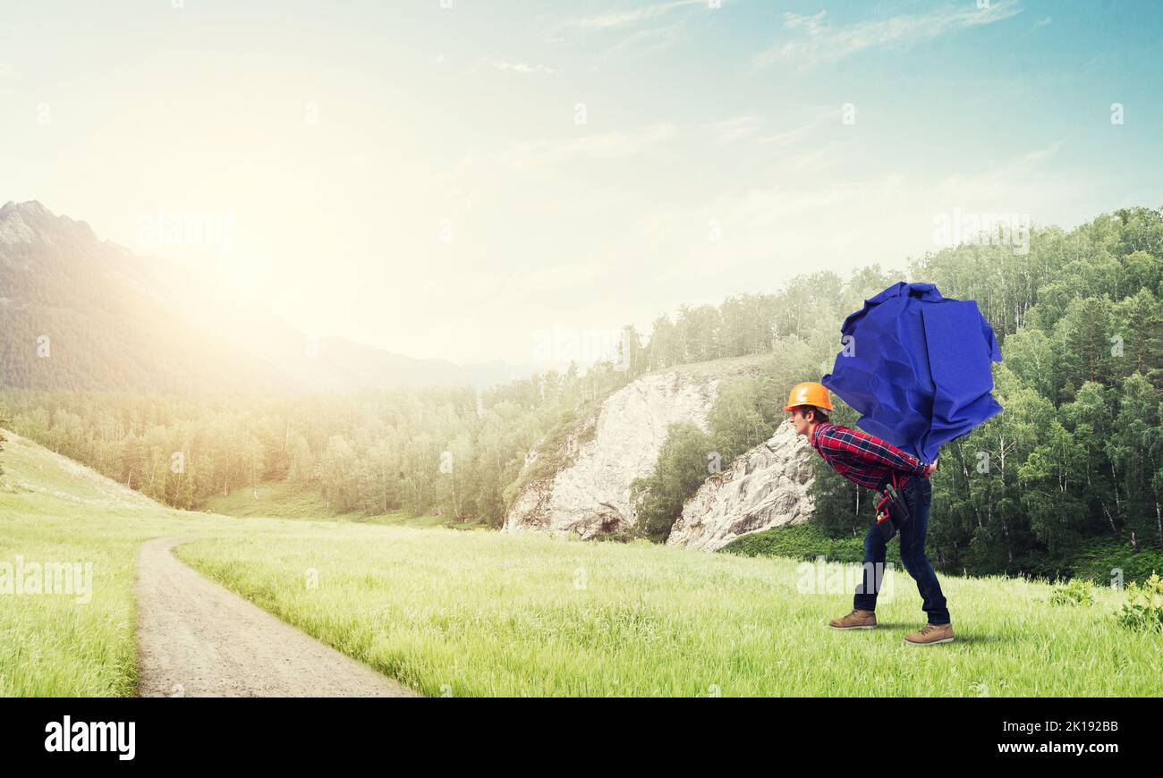 Engineer man carry load Stock Photo - Alamy