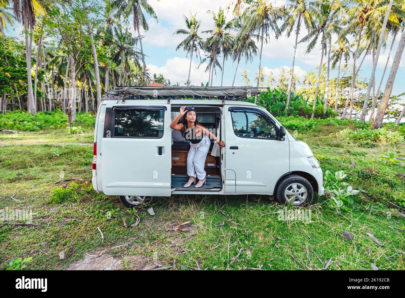 Tropical beach house coconut trees hi-res stock photography and images ...