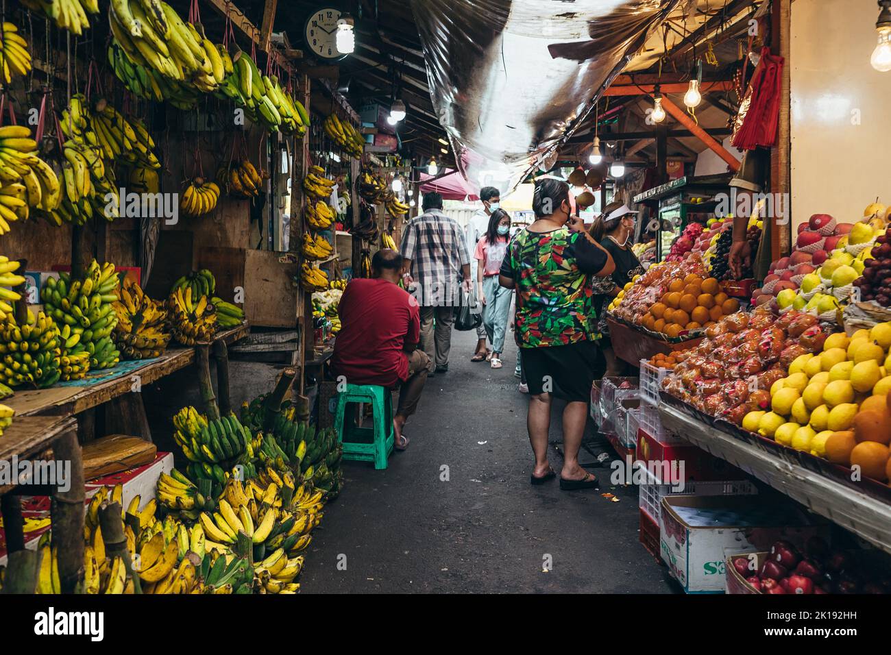 Indonesian locals buying fruits in the markets of Glodok Chinatown in ...
