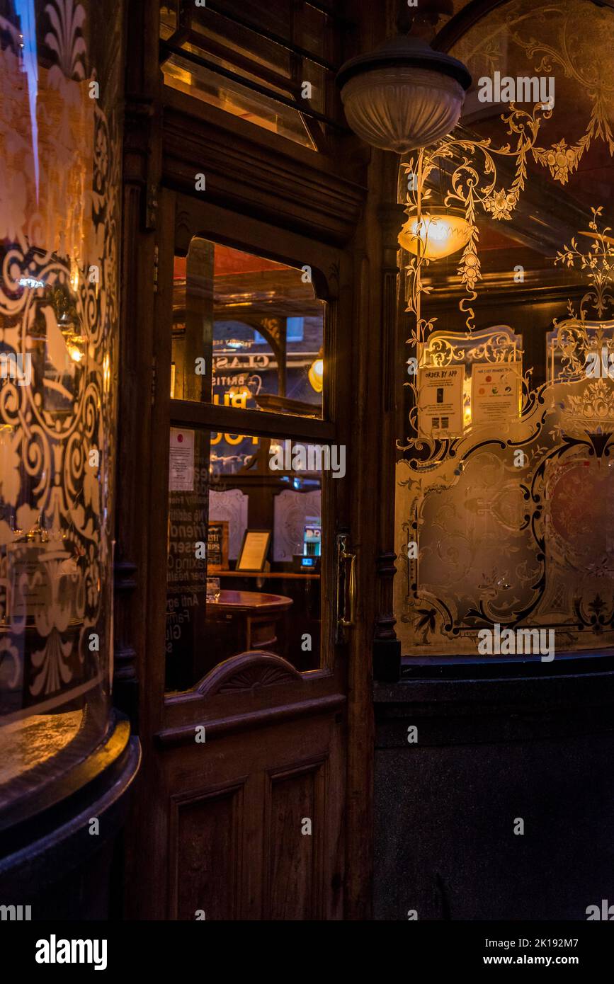Old pub window of the Green King pub in Camden Passage, a lively ...