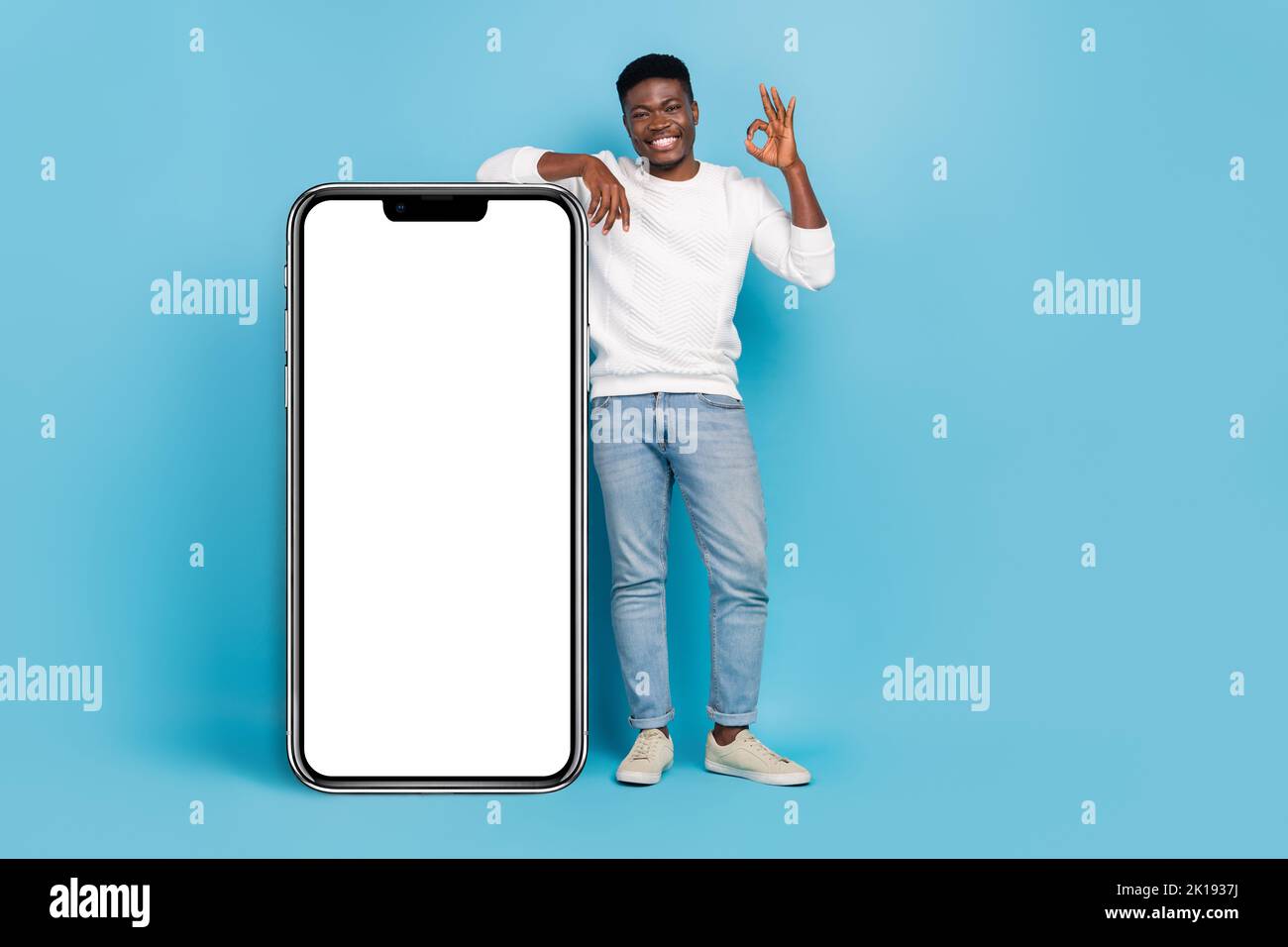 Full size body length photo of handsome male stand smart phone product ...