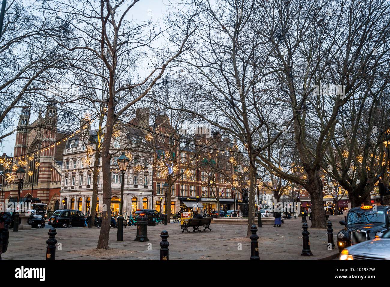 Sloane Square, a memorial city park decorated with Christmas lights ...