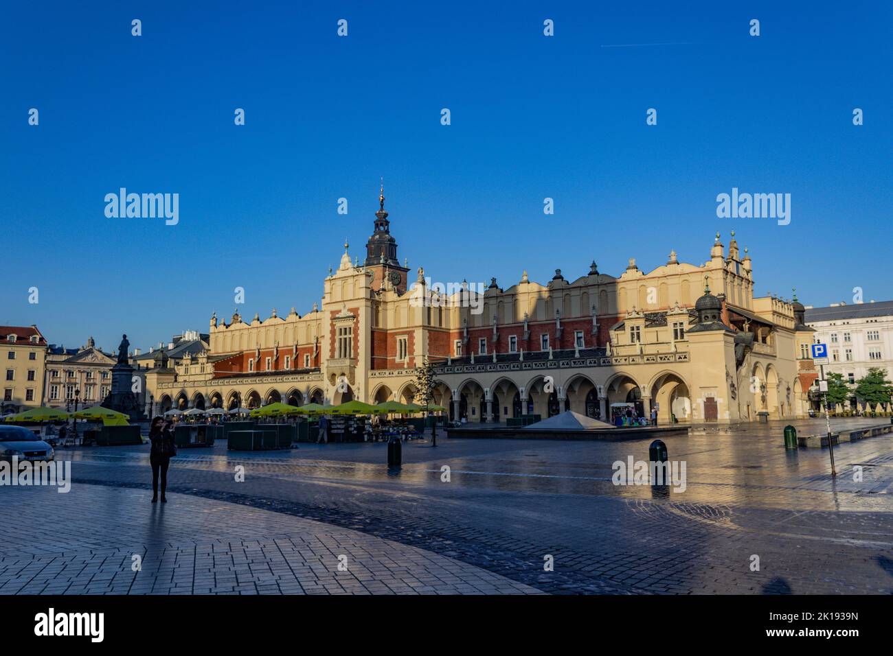 A scenic view of the Cloth Hall at the center of Krakow, Poland in blue ...