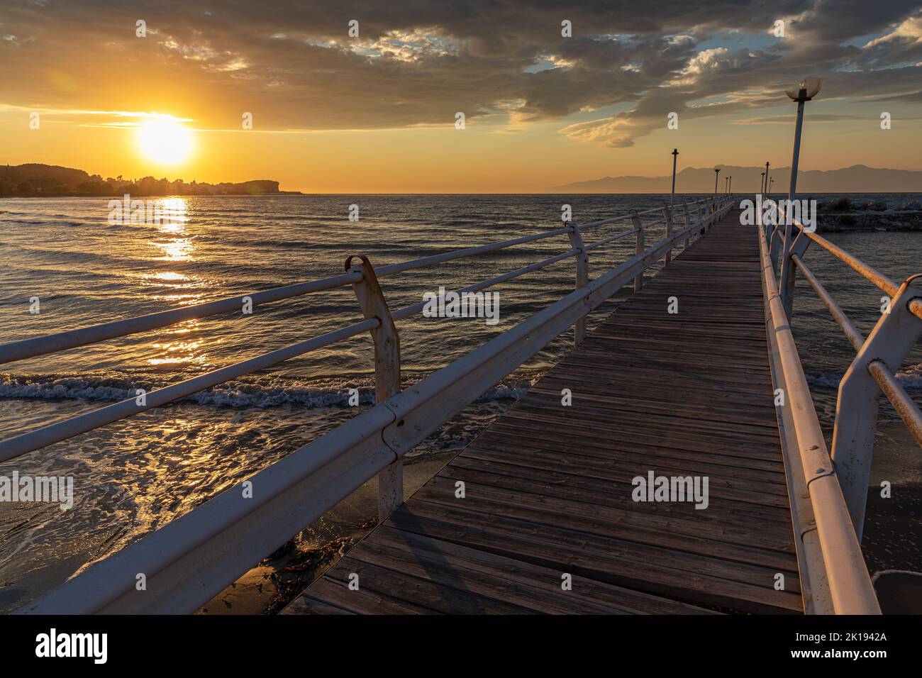 On the seafront of Roda, Corfu, Greece Stock Photo - Alamy