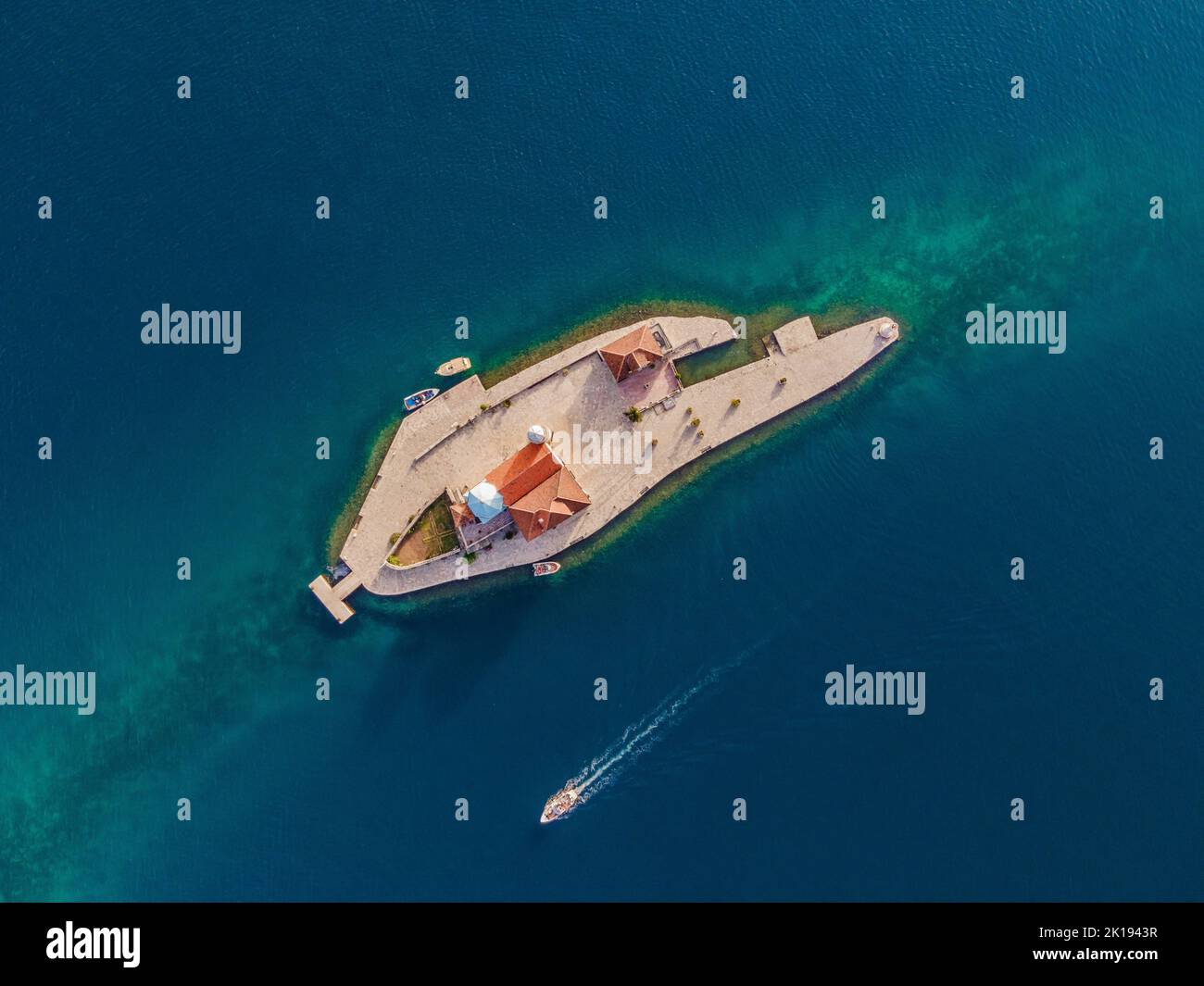 Picturesque island st. George and temple Gospa od Skrpela. Drone view ...