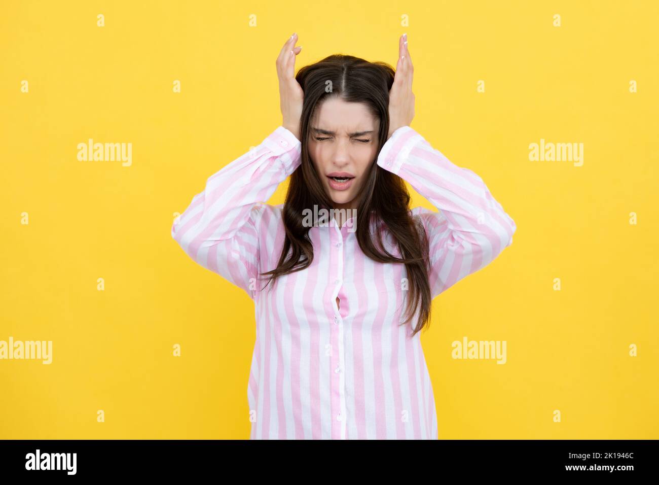 Portrait of young woman feeling stress or strain headache. Exhausted ...