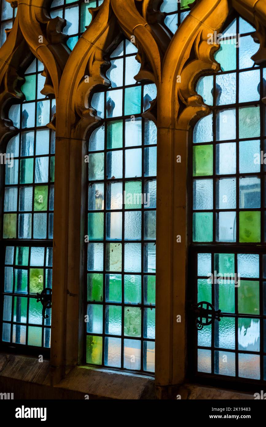 Stained glass window in refectory, St Bartholomew the Great church, a ...
