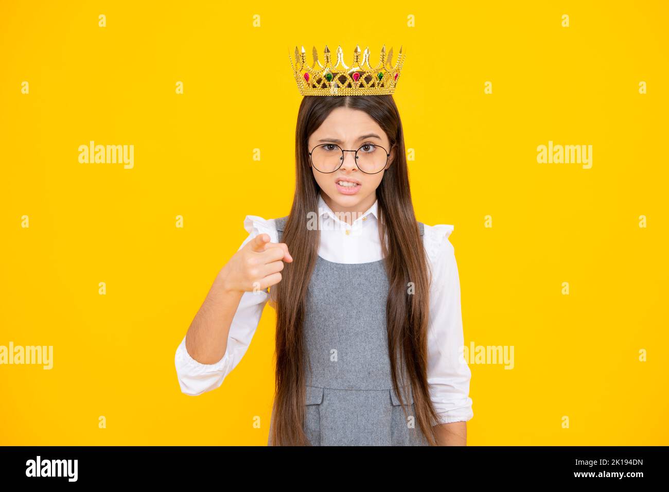 Girls birthday party, funny kid in crown. Imagine herself a queen ...