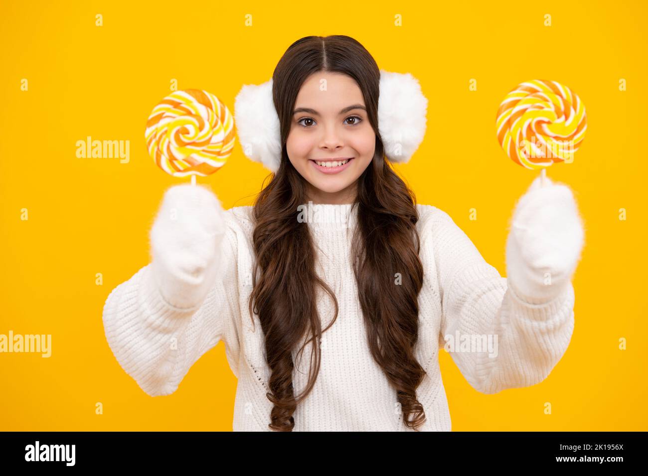 Teenager girl with caramel candies on sticks, sweet sugar addiction ...