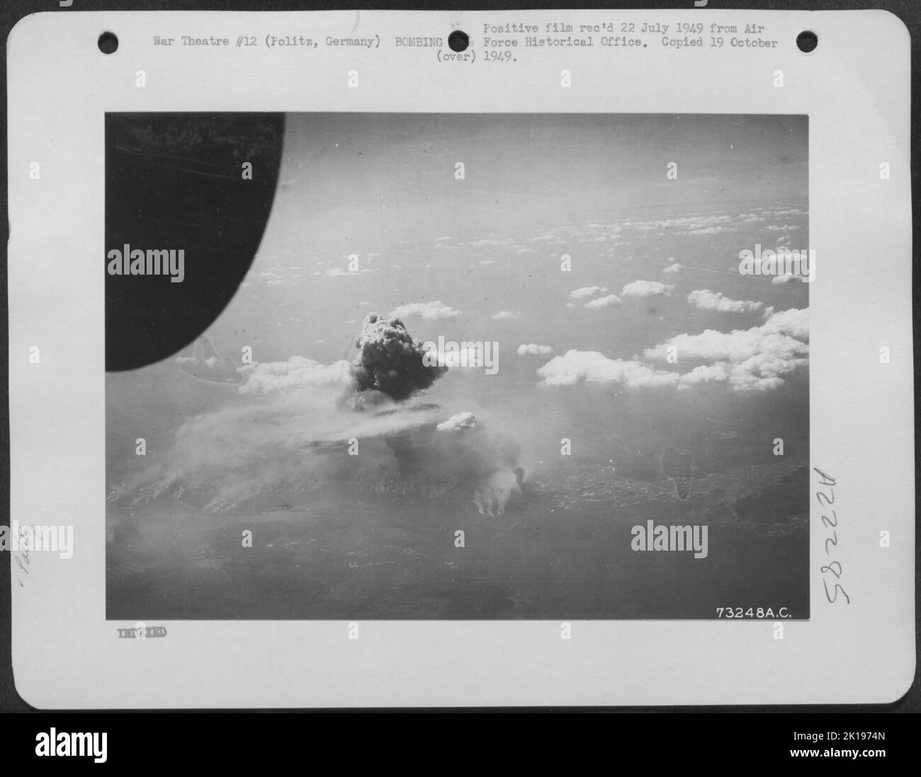 Looking Like An On-Rushing Tornado, A Huge Column Of Smoke Looms Above ...