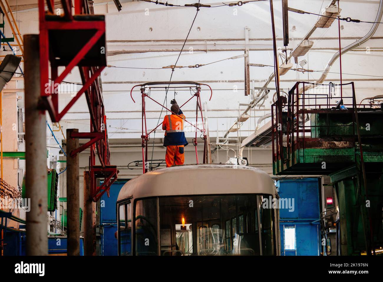 Tram in service depot. Maintenance and repairing of pantograph Stock ...