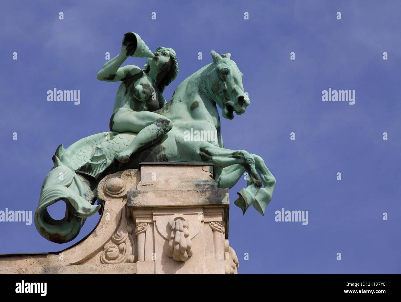 Women's equestrian statue with curtain, building decoration Stock Photo ...