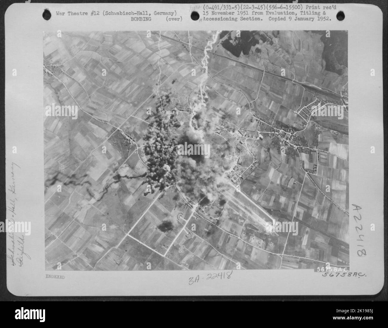 Bombs from B-17s and B-24s, part of a force of 1300 U.S. 8th Air Force ...