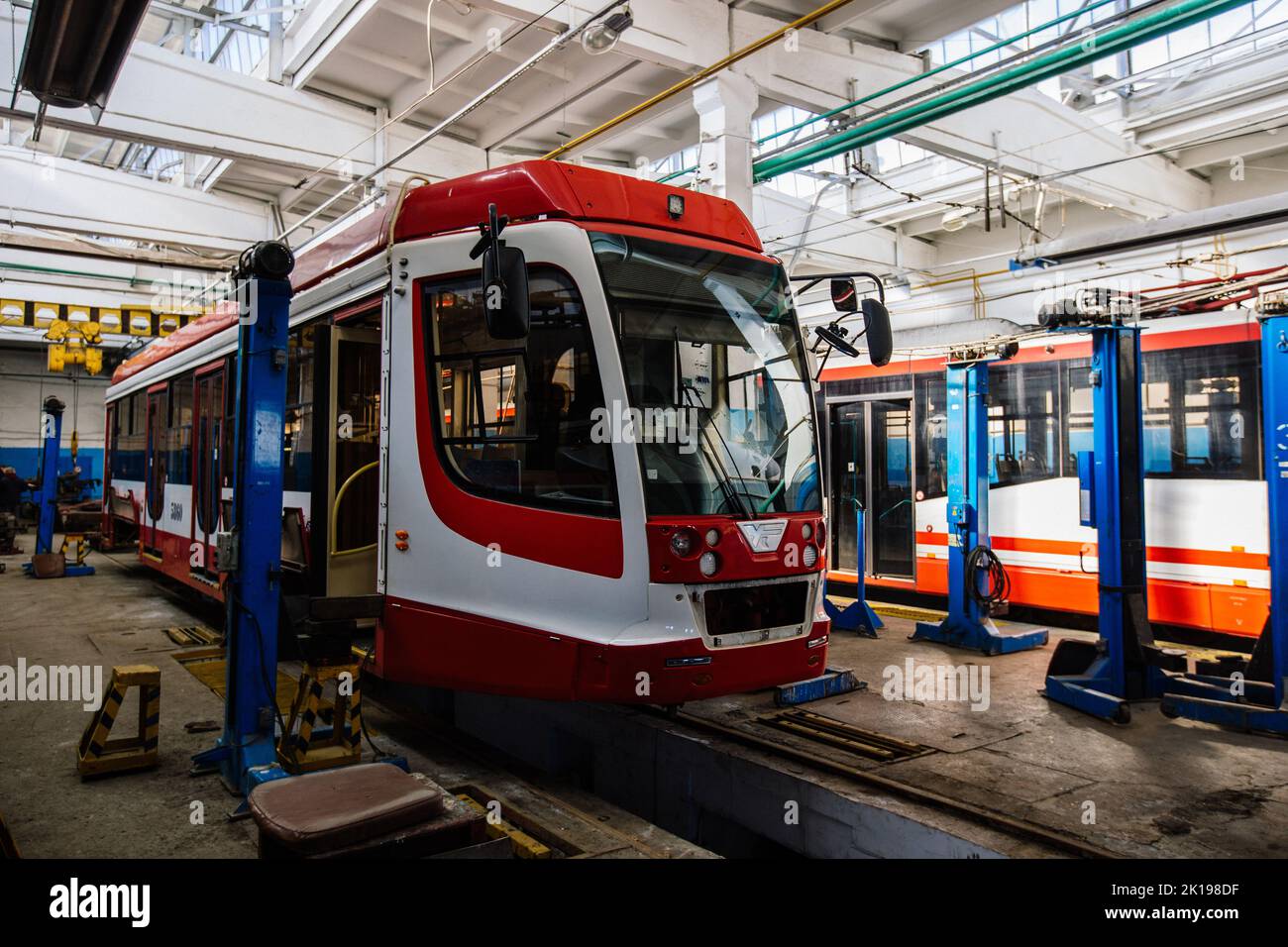 Trams in service depot. Maintenance and repairing of trams Stock Photo ...