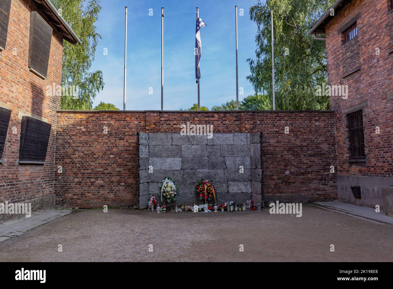 The Memorial wall in Memorial and Museum Auschwitz-Birkenau in Poland ...