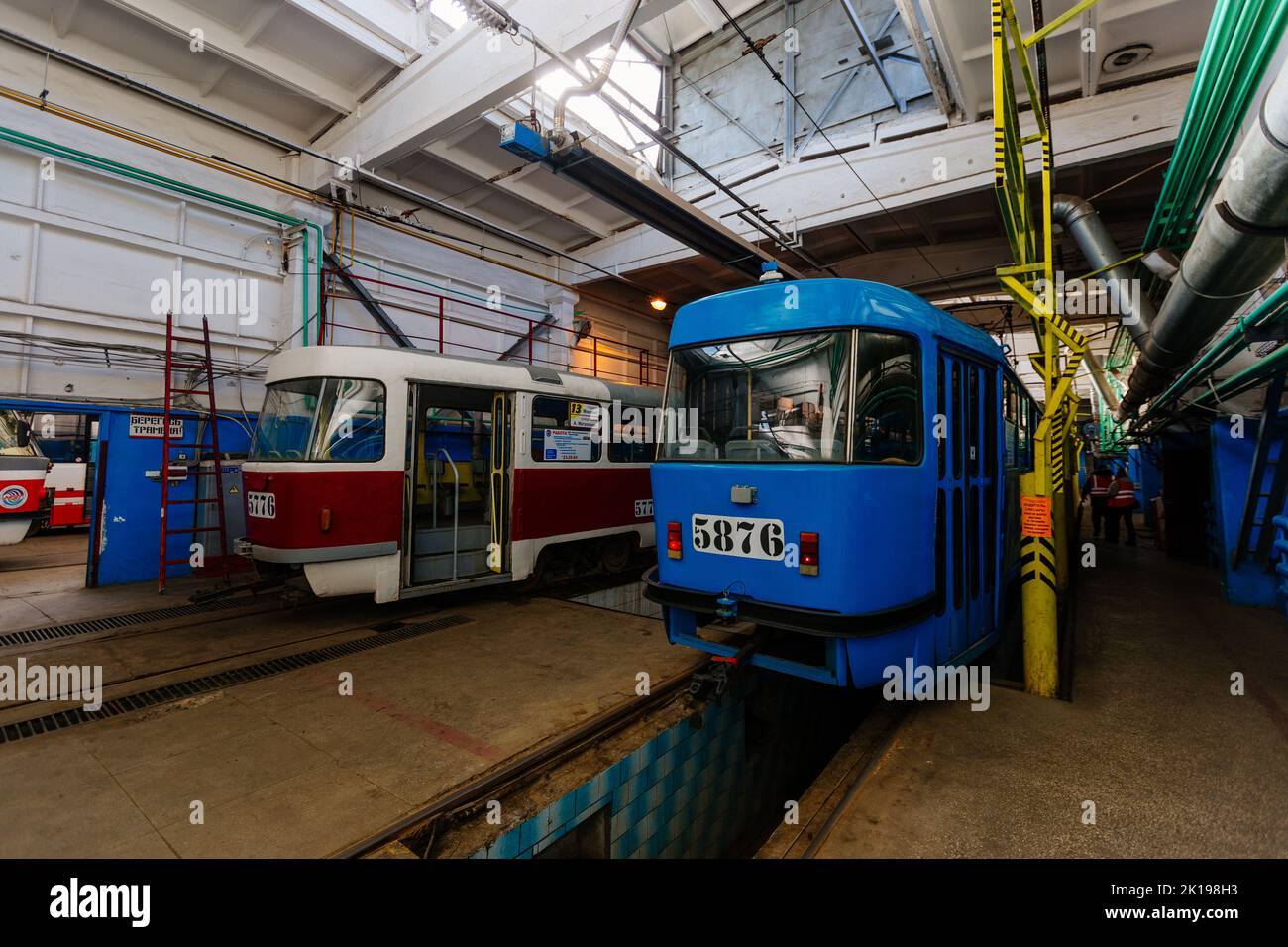 Trams in service depot. Maintenance and repairing of trams Stock Photo ...