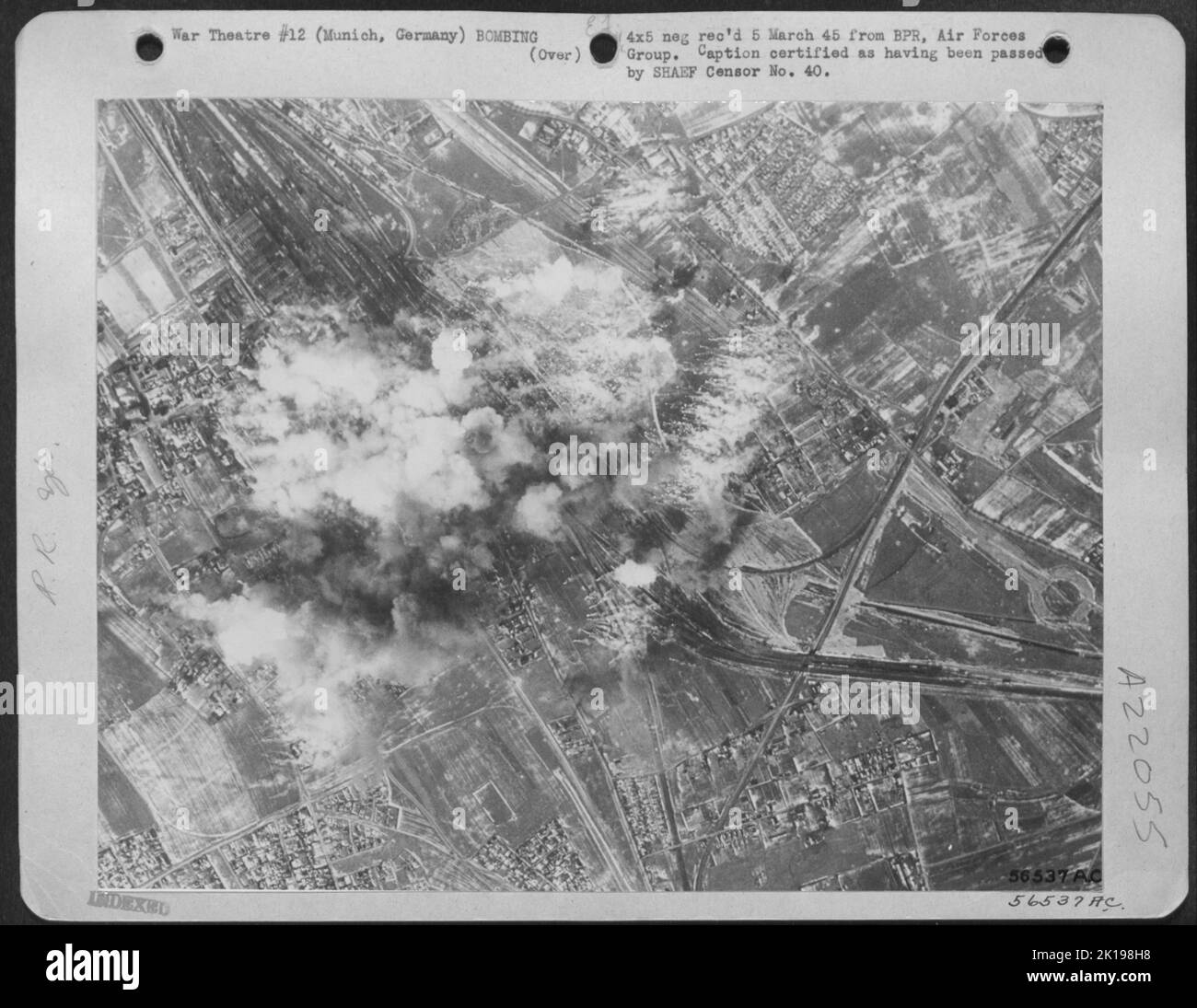 Bursting bombs send up sprays of debris as they take toll on the rail ...