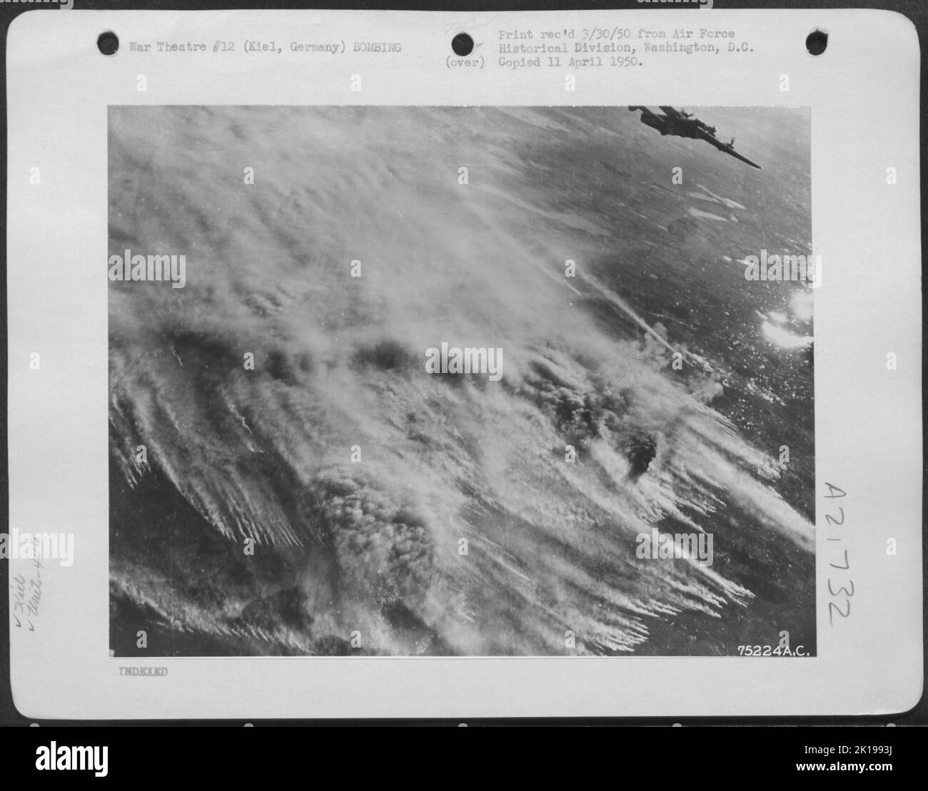 A Consolidated B-24 Liberator Of The 44Th Bomb Group, Circles The Smoke ...