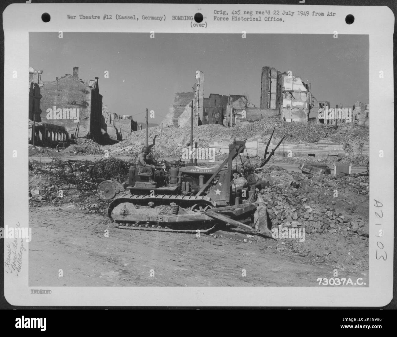 Engineers Clean Away The Rubble From These Bomb Damaged Buildings In ...