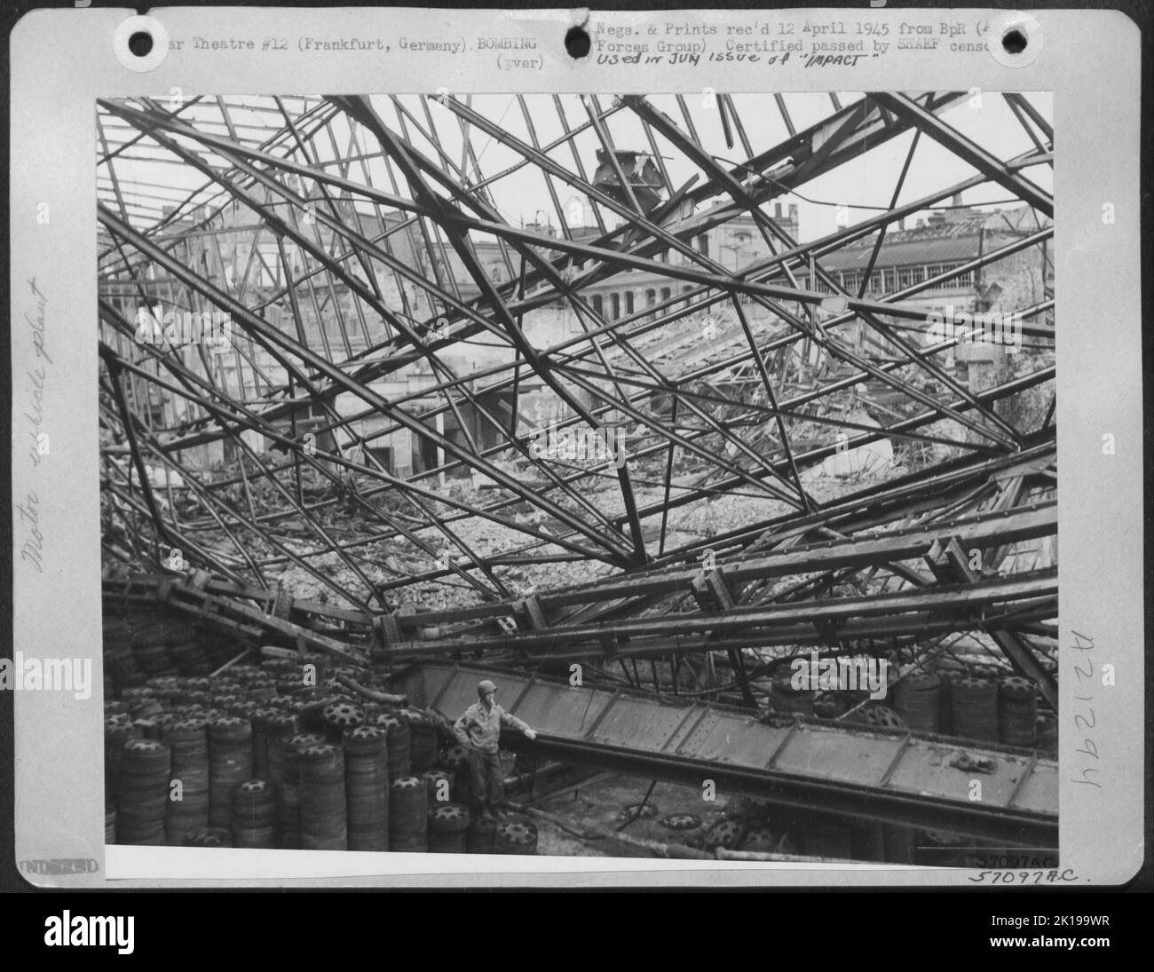 Leaning On A Twisted Steel Beam, An American Corporal Takes Stock Of ...