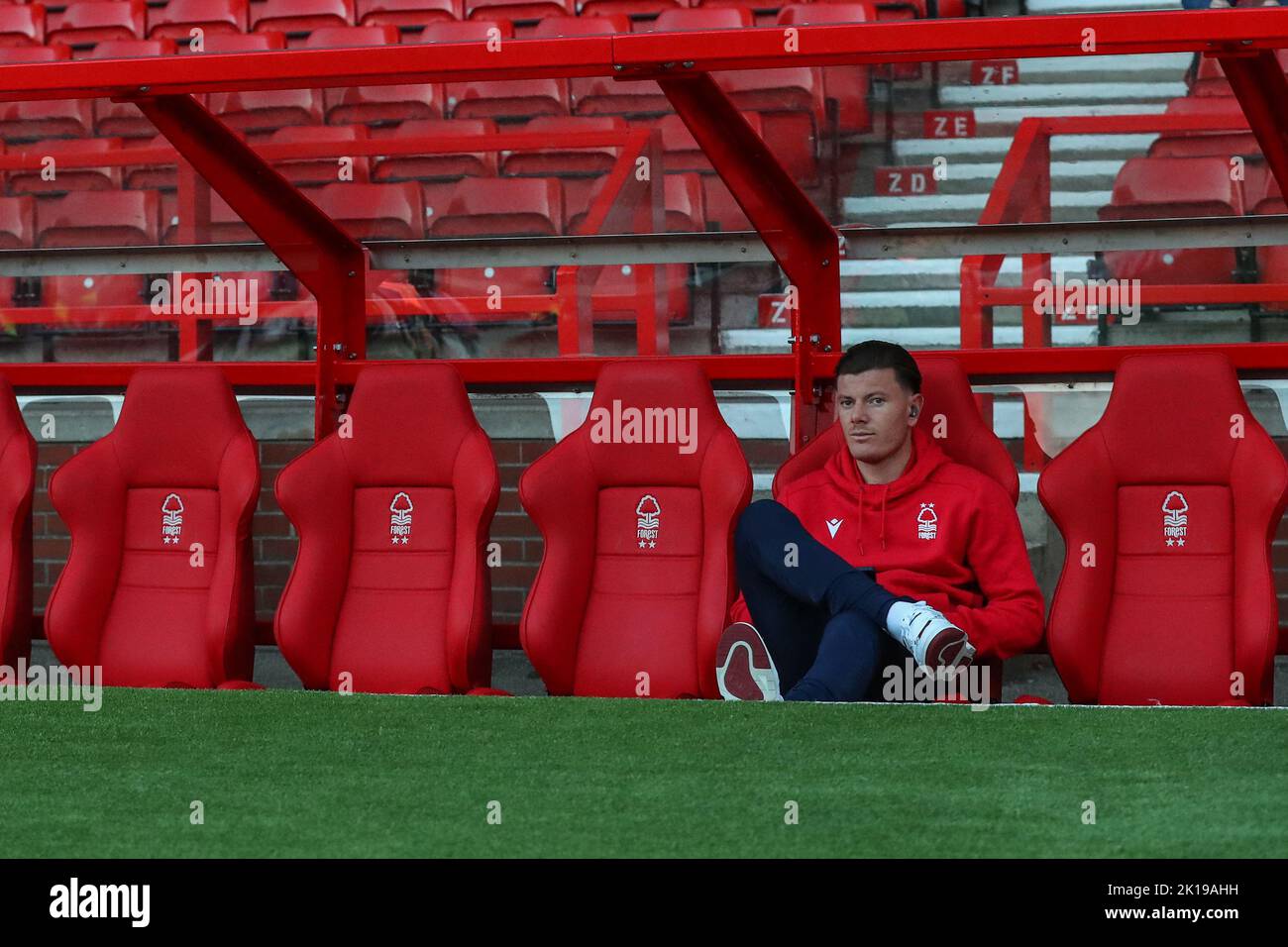 Giulian Biancone #2 of Nottingham Forest takes a seat on the bench ...