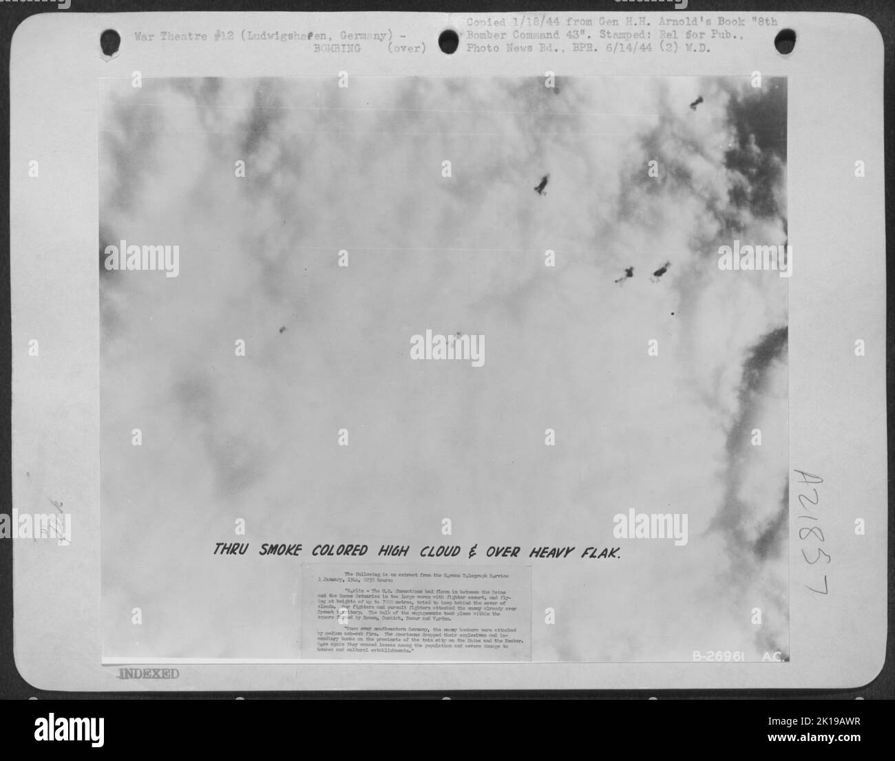 Smoke colored high cloud and heavy flak over Ludwigshafen, Germany. (30 ...